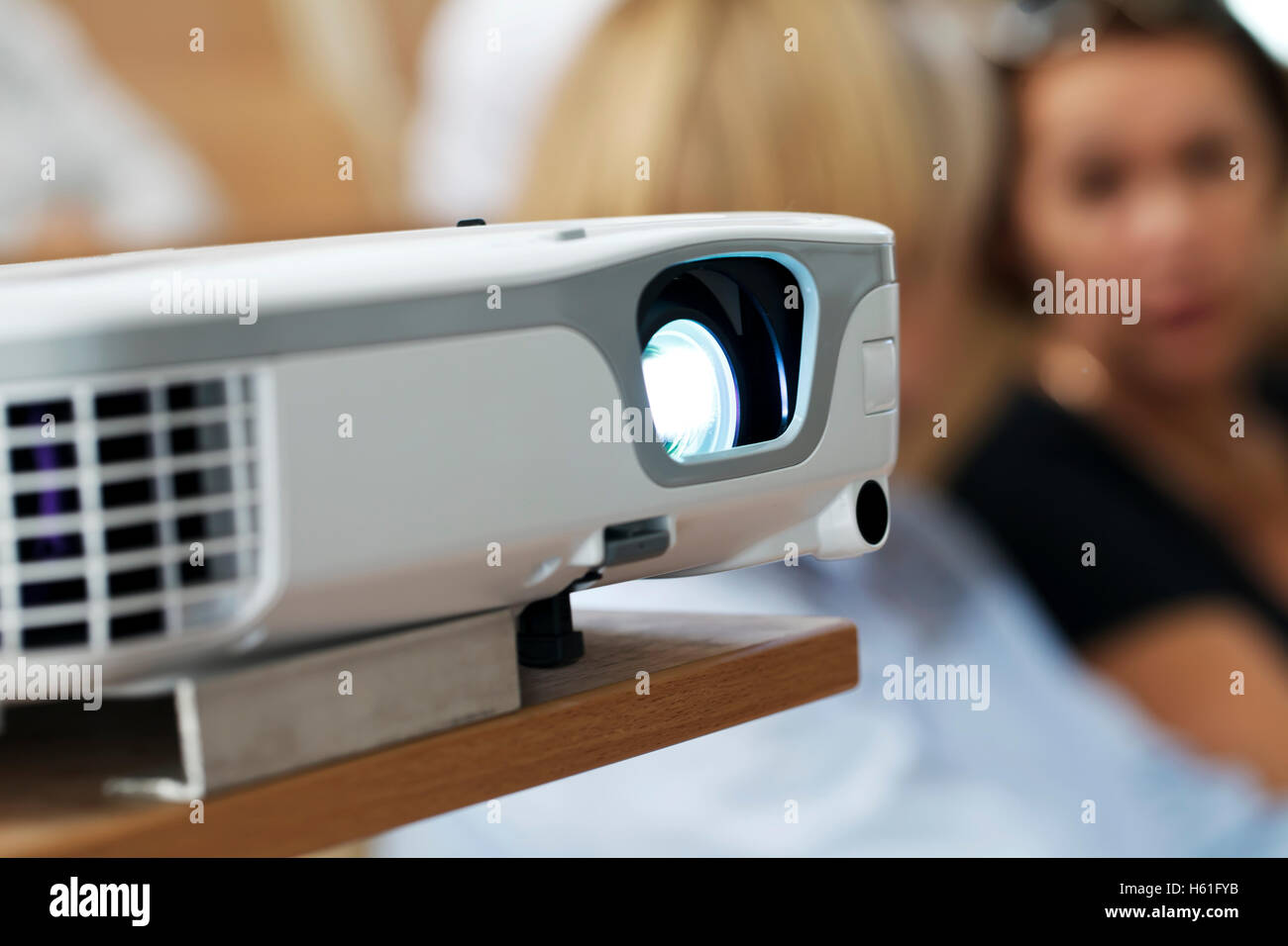 digital projector at the presentation close-up on the foreground ...