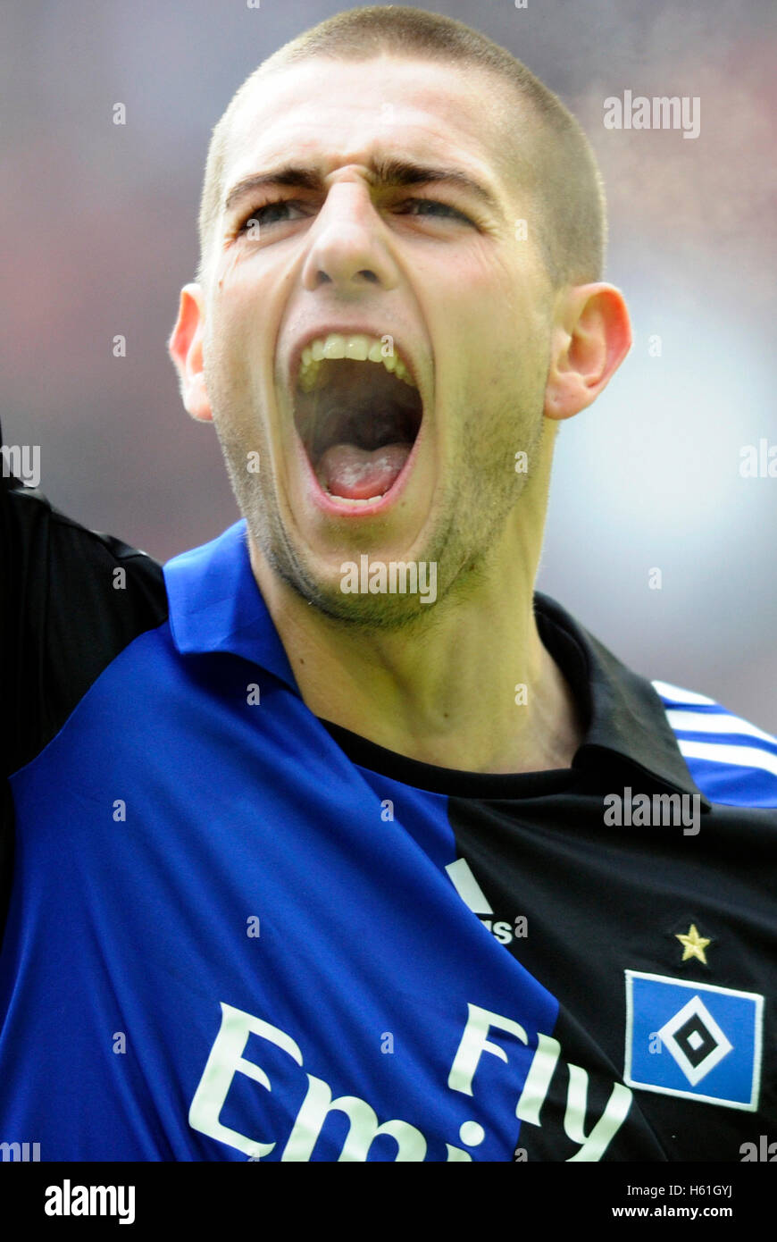 Cheering mladen petric hsv football club 1 hi-res stock photography and ...