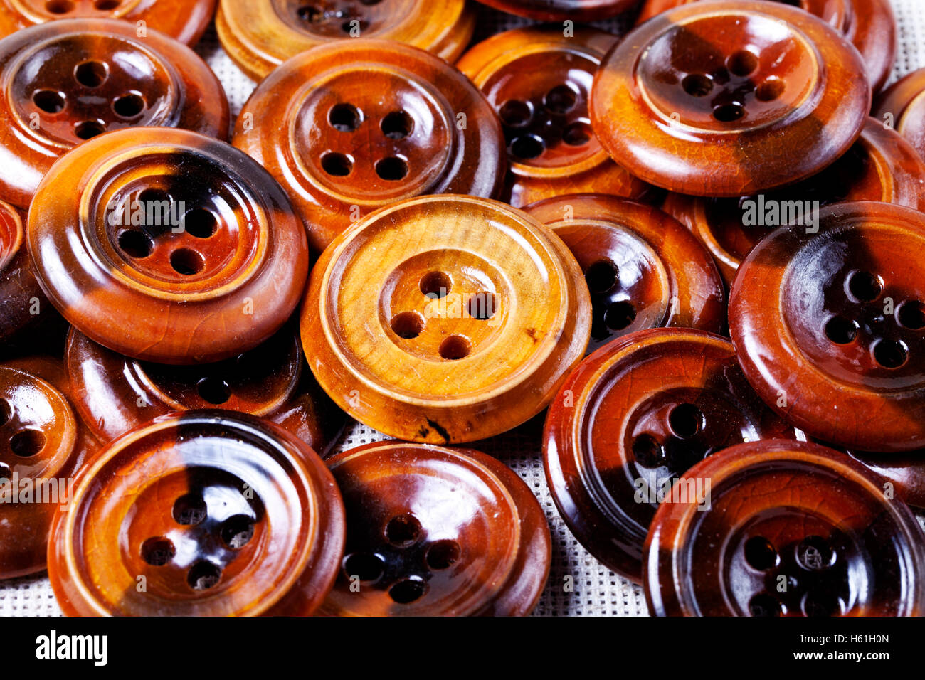 a Vintage wooden buttons background Stock Photo - Alamy