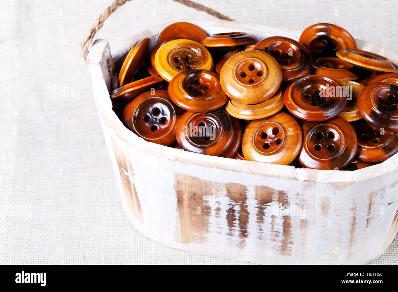a Vintage wooden buttons background Stock Photo - Alamy