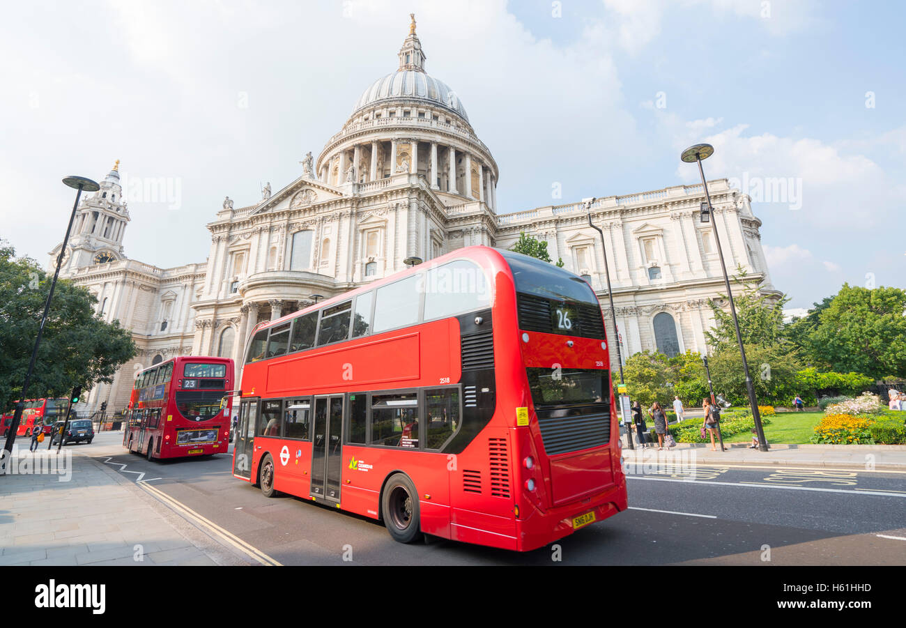 Red Buses in the streets London - typical street view Stock Photo - Alamy