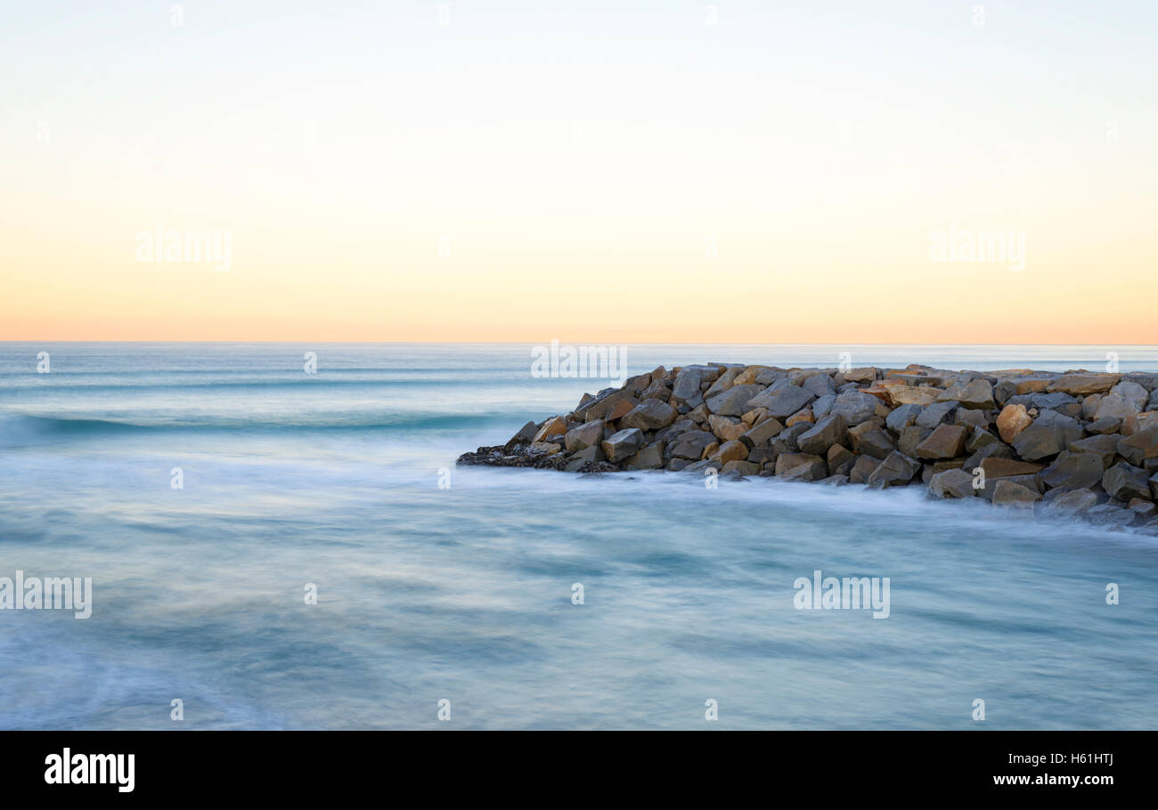 rock jetty, ocean view Stock Photo - Alamy