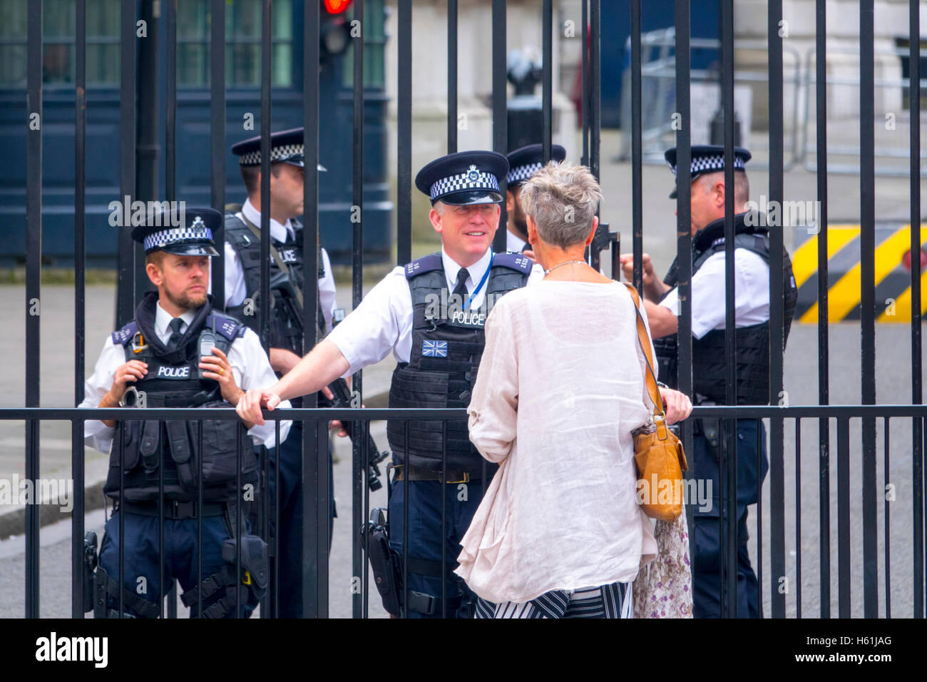 London Police officers guarding Downing Street Stock Photo - Alamy