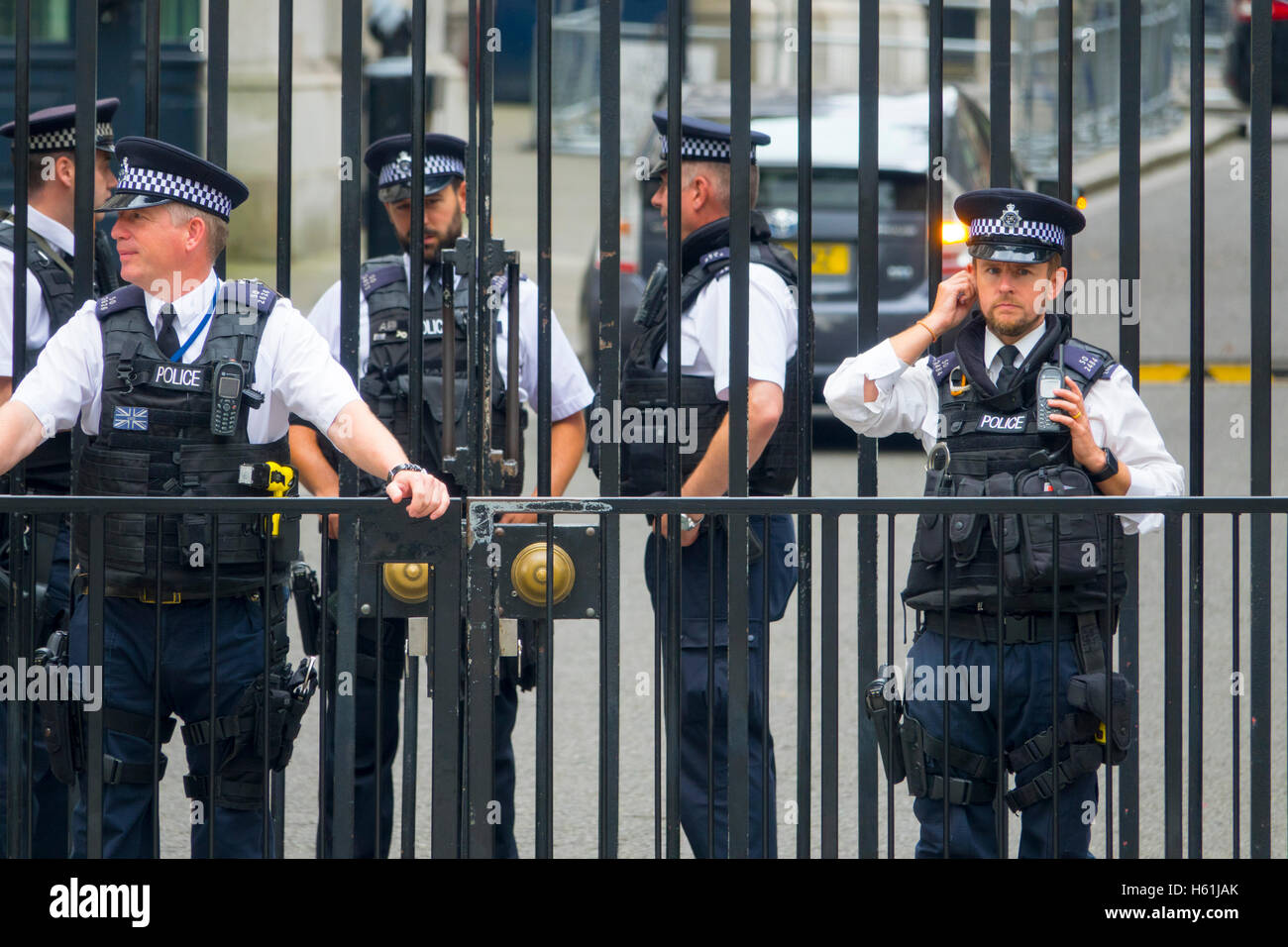 London Police officers guarding Downing Street Stock Photo - Alamy