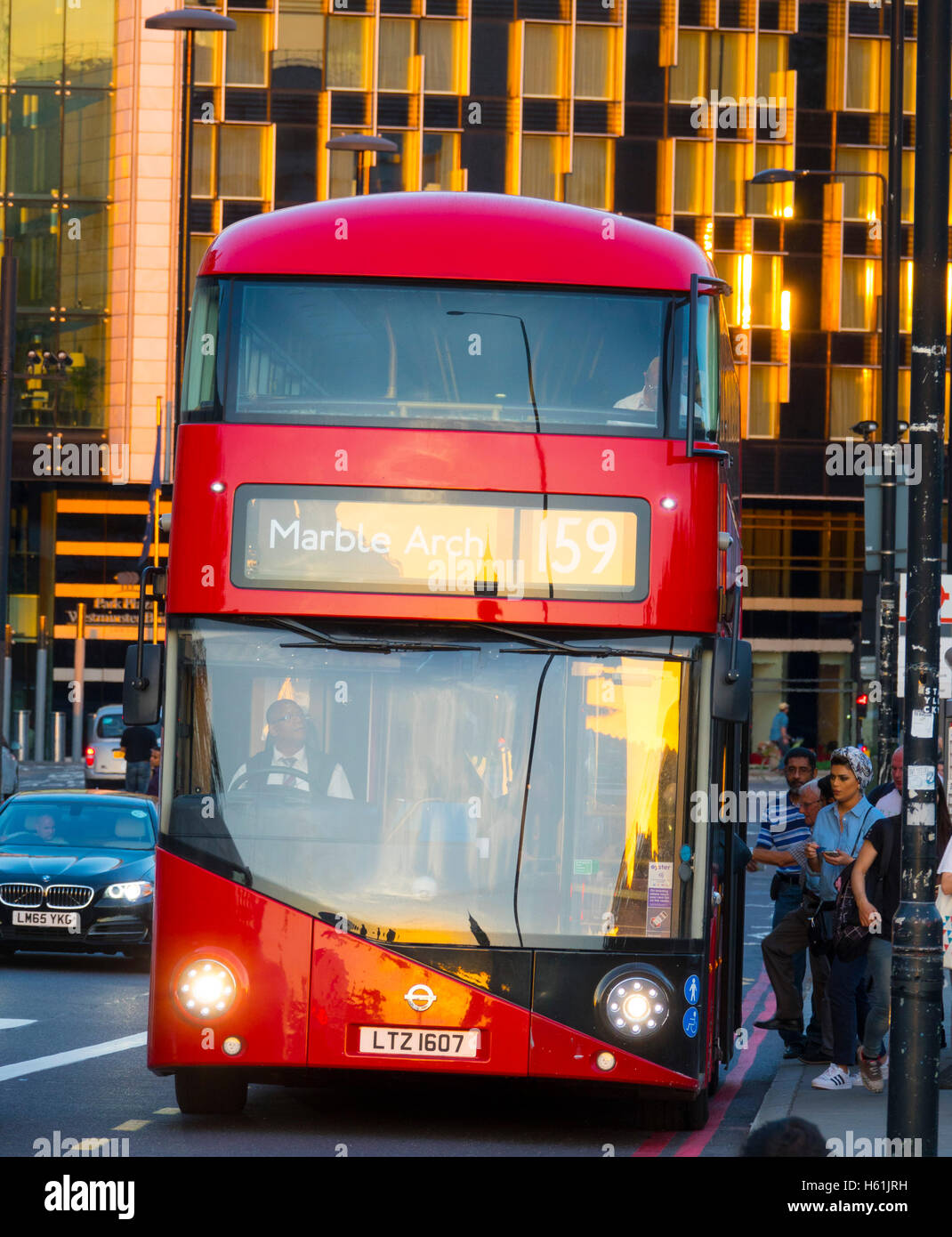 Red Buses on Westminster Bridge in London at sunset Stock Photo - Alamy