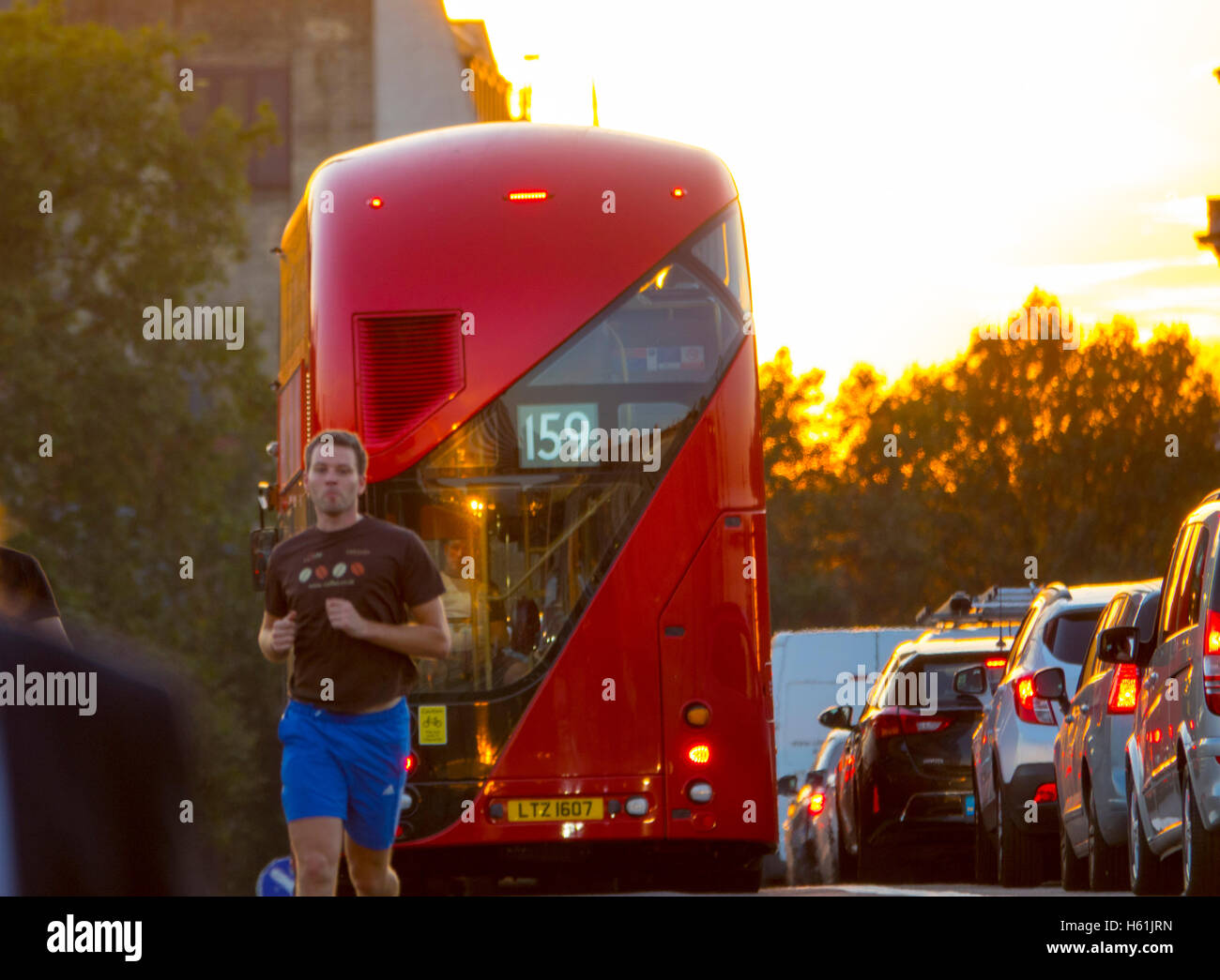 Red Buses on Westminster Bridge in London at sunset Stock Photo - Alamy