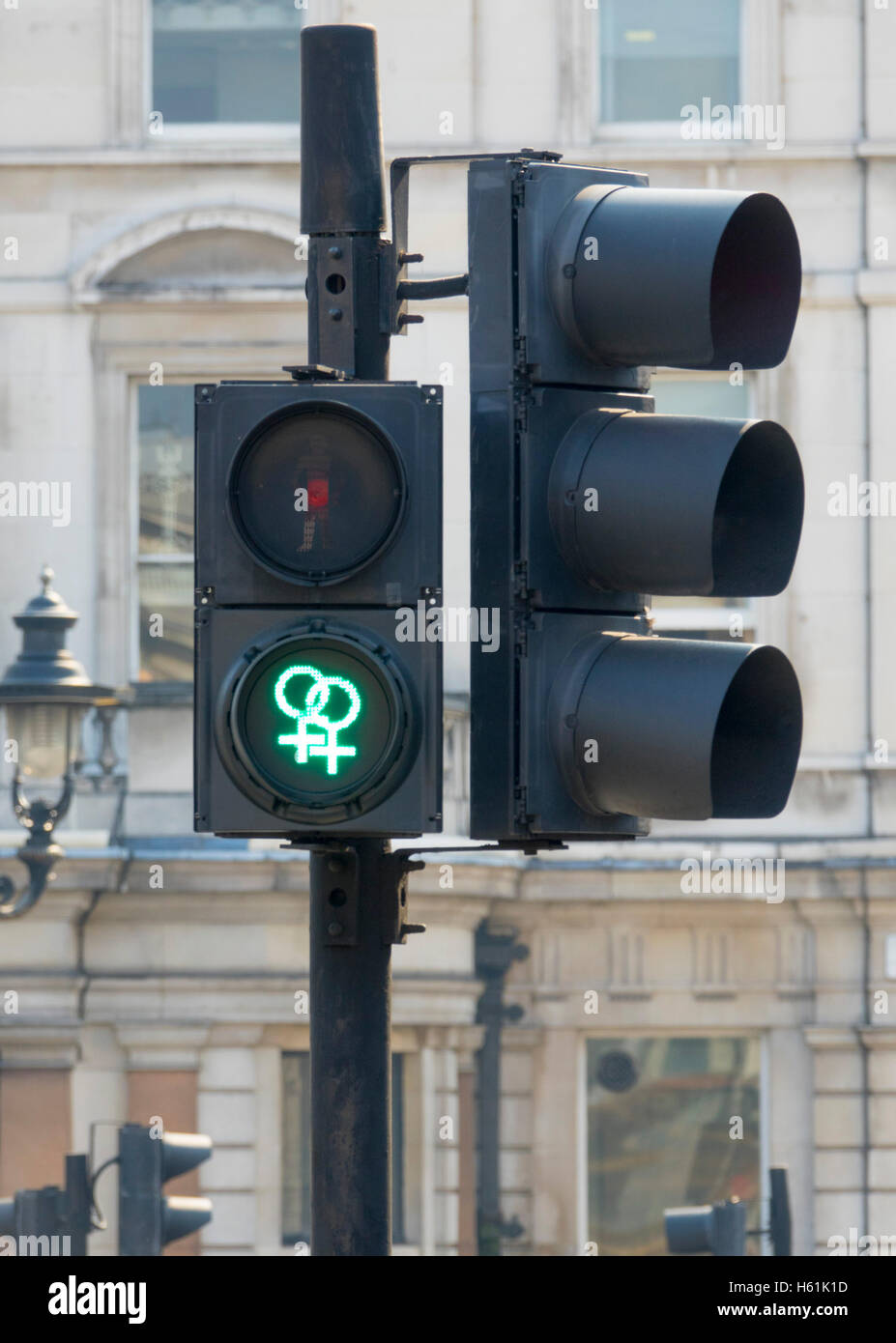 New green signals at Trafalgar Square in London Stock Photo - Alamy