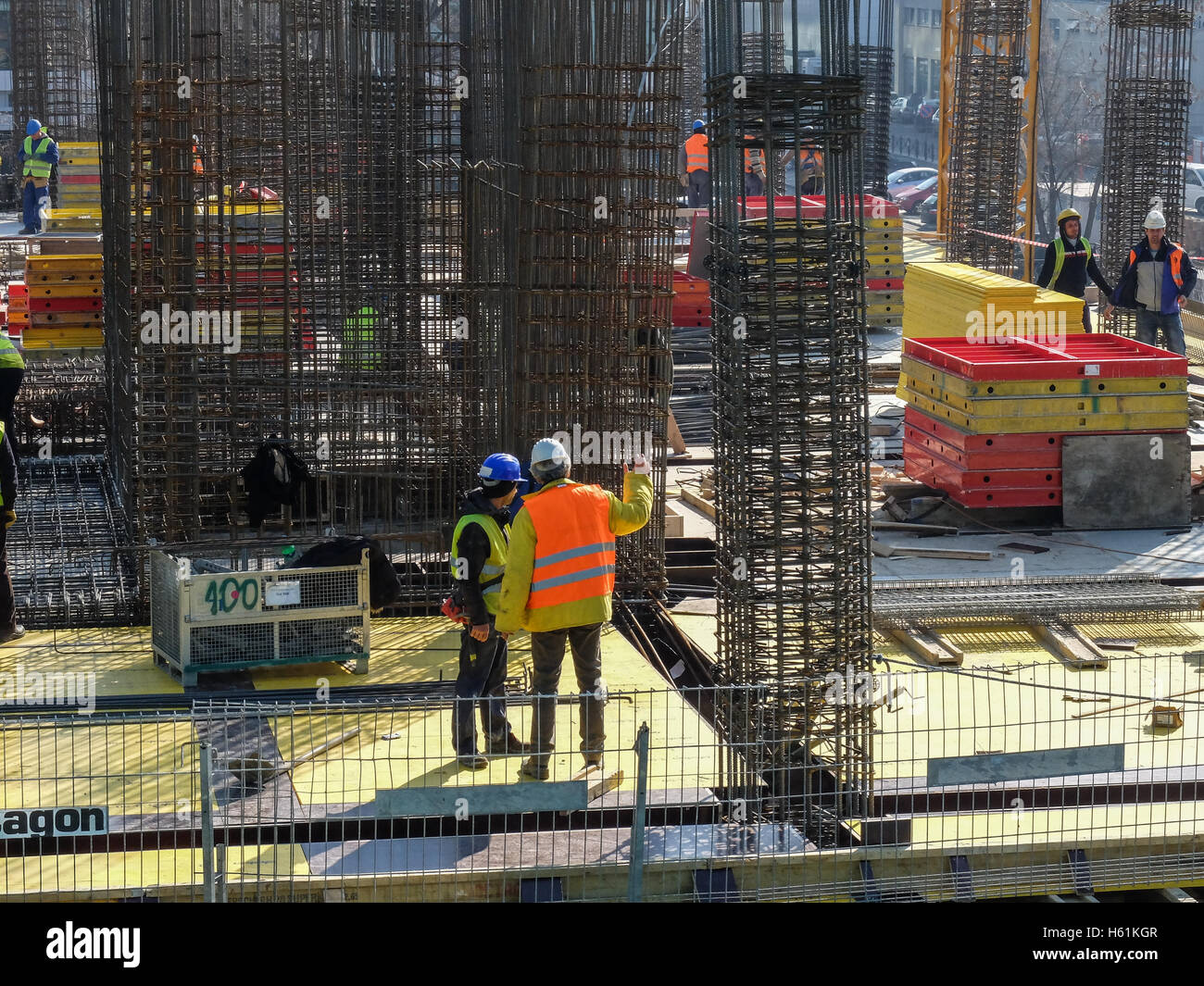 Bucharest, Romania, 9 February 2016: Laborers work at the construction ...