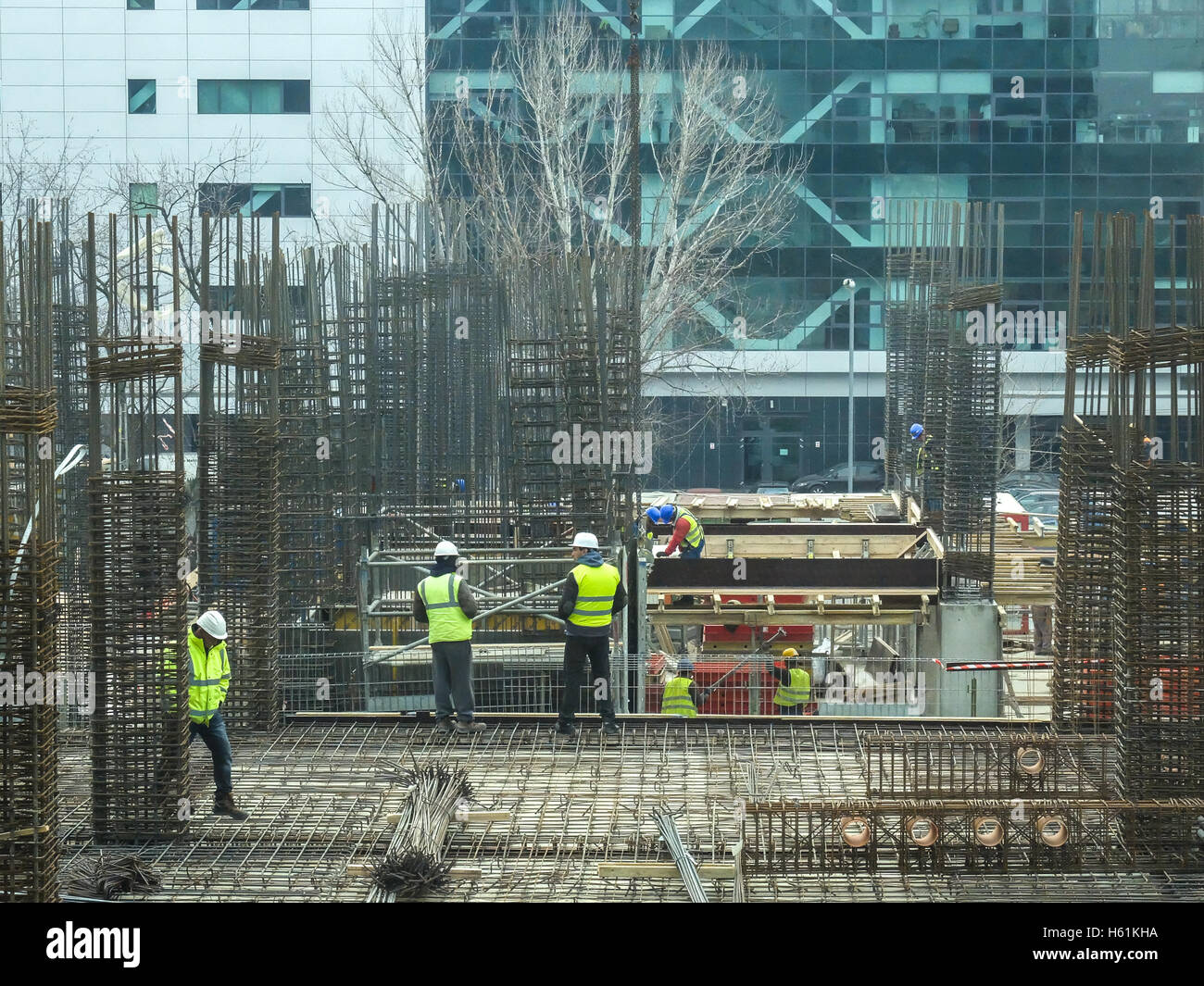 Bucharest, Romania, 10 February 2016: Laborers work at the construction ...