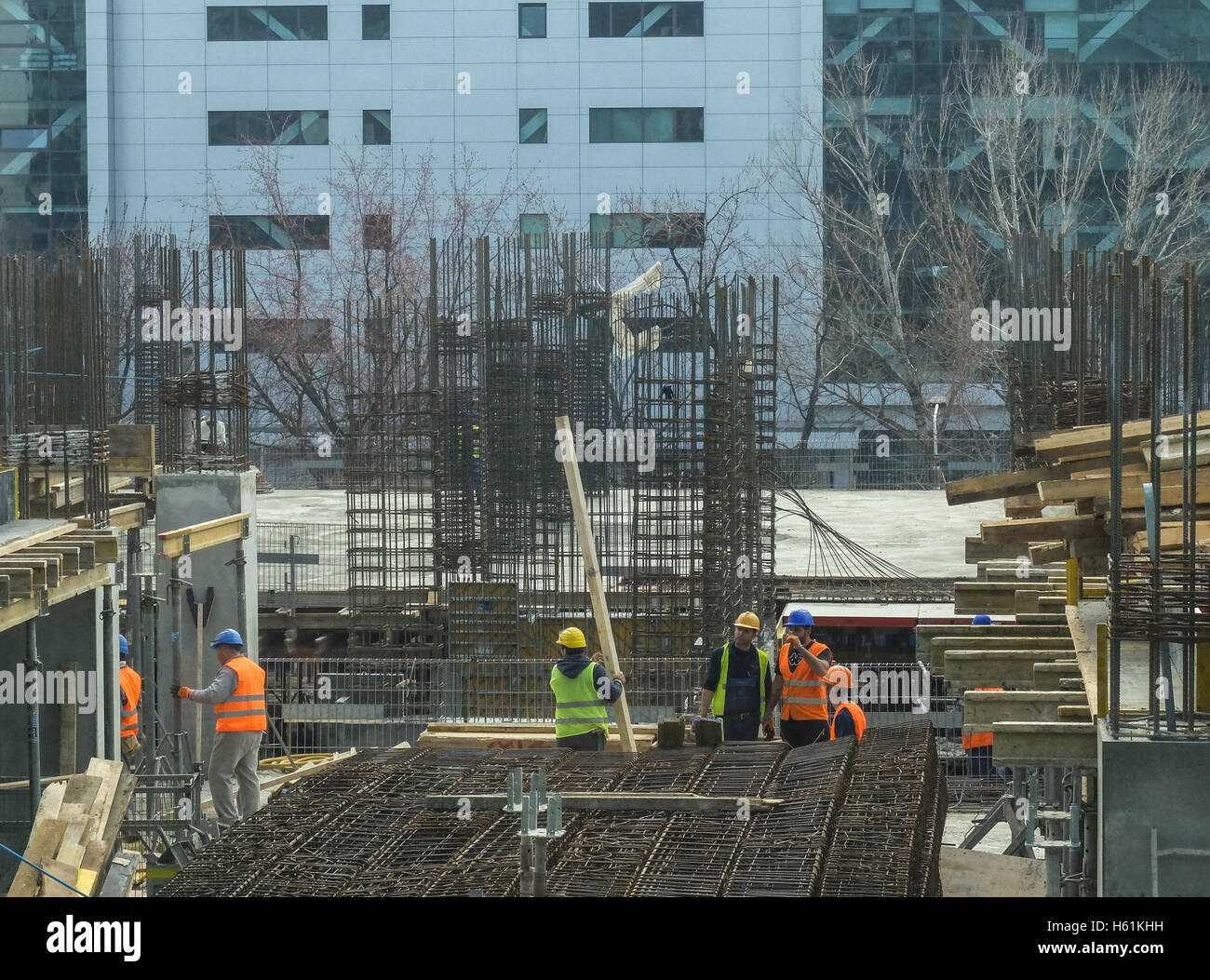 Bucharest, Romania, 16 February 2016: Laborers work at the construction ...