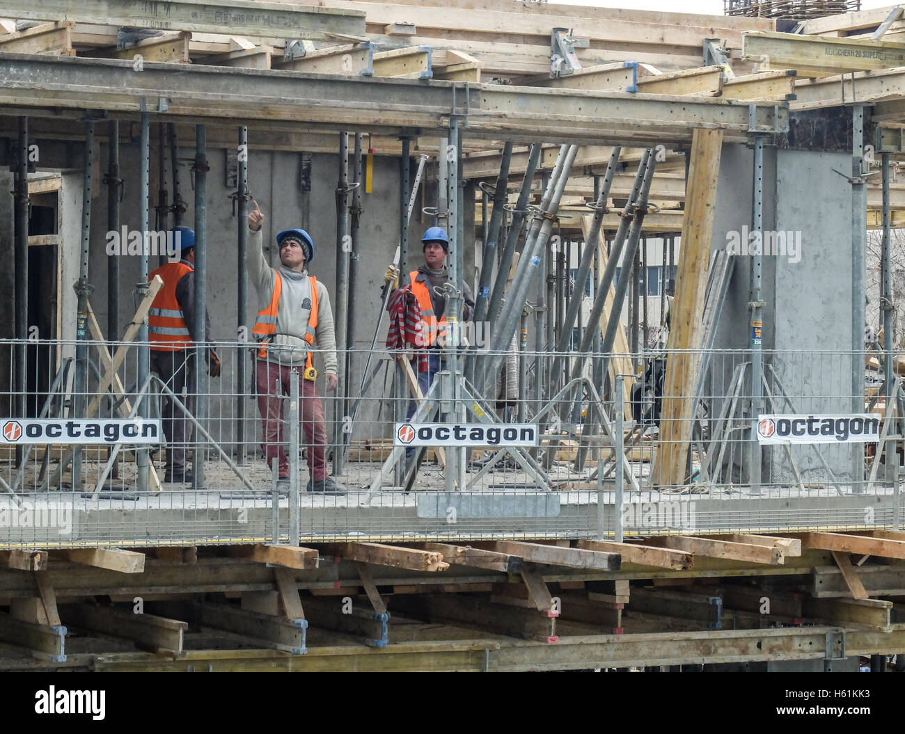 Bucharest, Romania, 25 February 2016: Laborers work at the construction ...