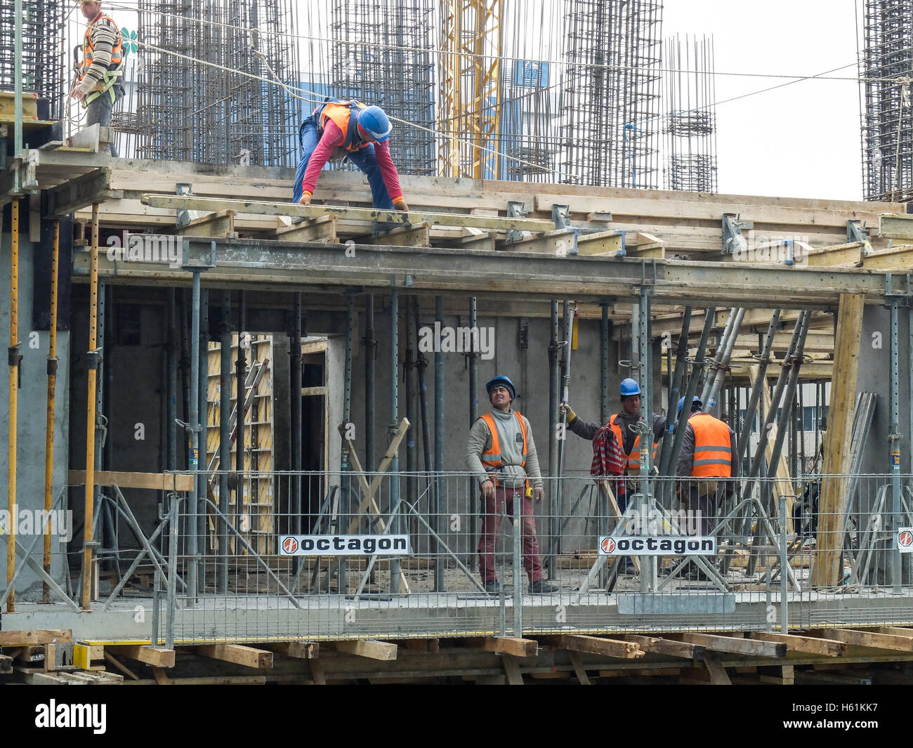 Bucharest, Romania, 25 February 2016: Laborers work at the construction ...