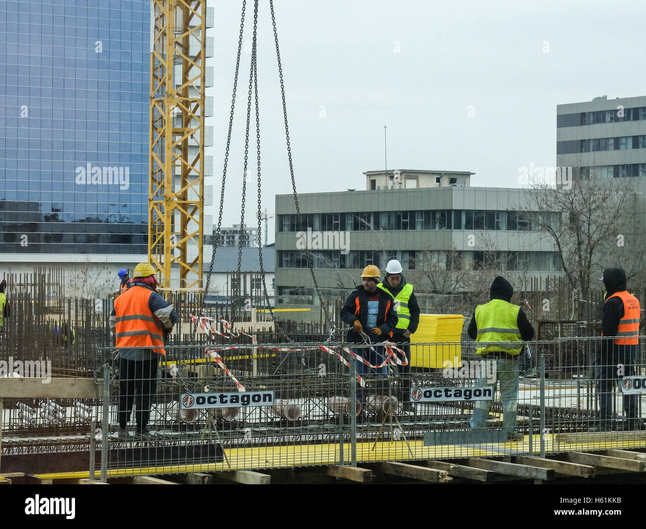 Bucharest, Romania, 19 February 2016: Laborers work at the construction ...