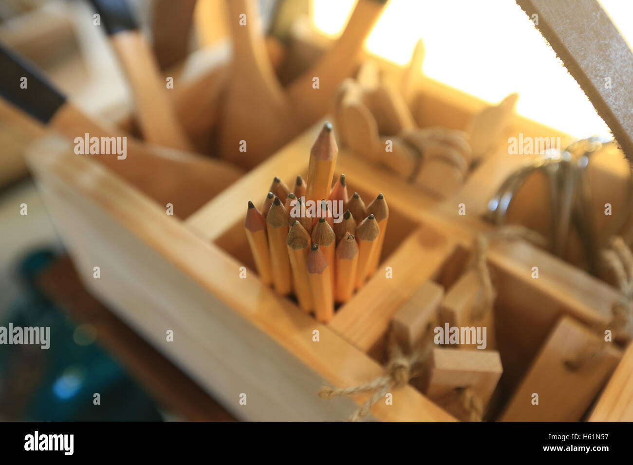 Pencils in a wooden box Stock Photo - Alamy