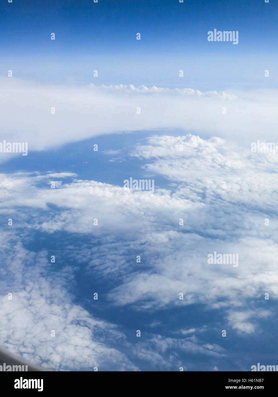 Beautiful cloudscape on a blue sky as seen from above Stock Photo - Alamy