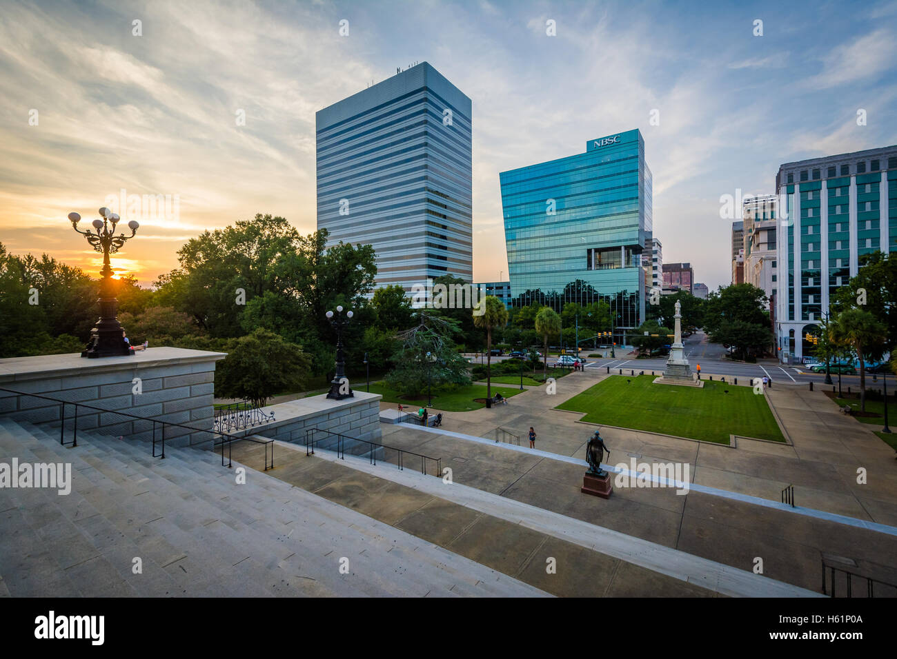 Steps to the South Carolina State House and modern buildings at sunset ...