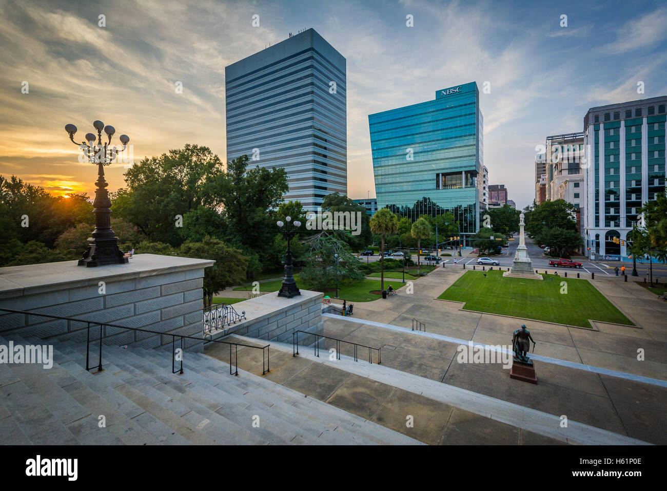 Steps to the South Carolina State House and modern buildings at sunset ...