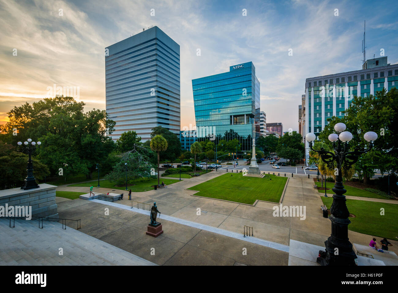 Steps to the South Carolina State House and modern buildings at sunset ...