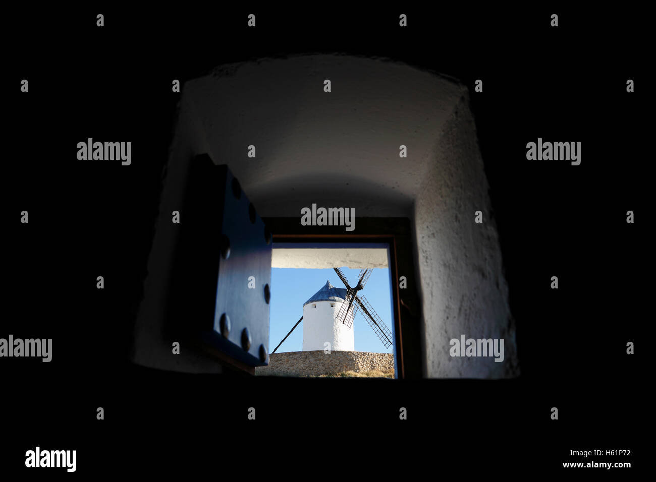 View of a Spanish windmill through the window of another windmill Stock ...