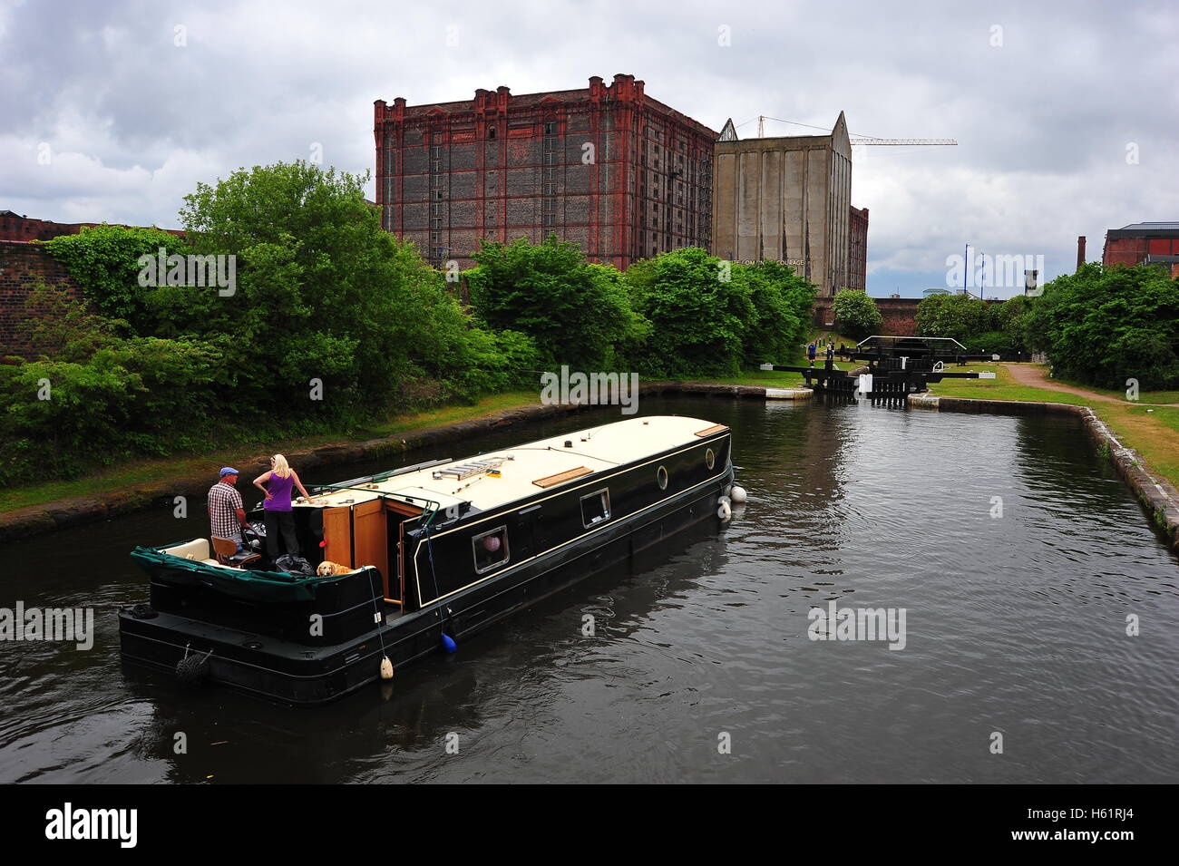 Narrow boat sailing through the lock system on the Leeds Liverpool ...