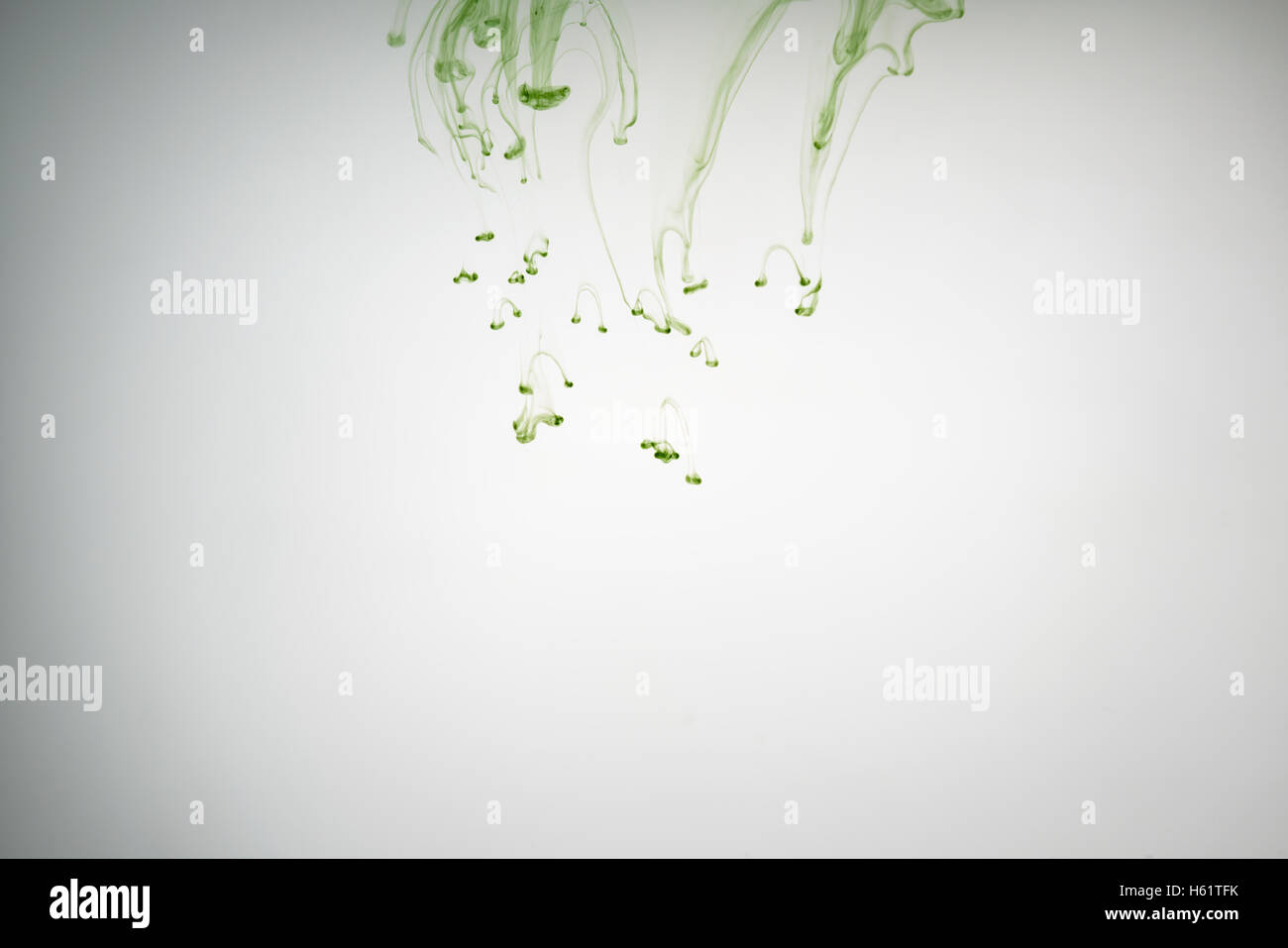 green ink poured in water Stock Photo - Alamy
