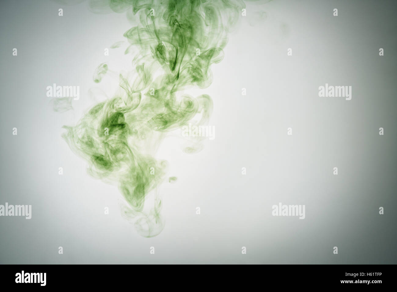 green ink poured in water Stock Photo - Alamy