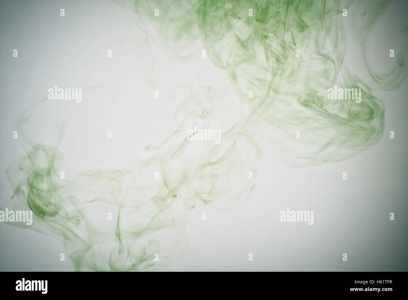 green ink poured in water Stock Photo - Alamy