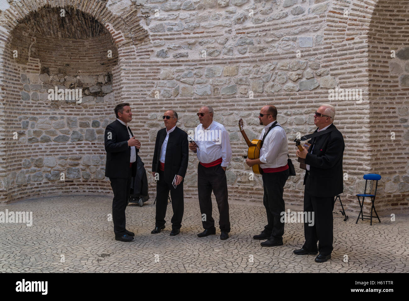 Traditional band or klapa, a cappella singers, playing and singing ...