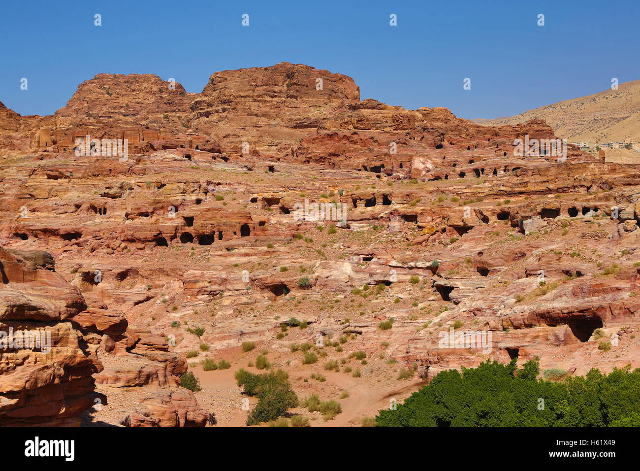 Tombs in sandstone rocks in the rock city of Petra, Jordan Stock Photo ...
