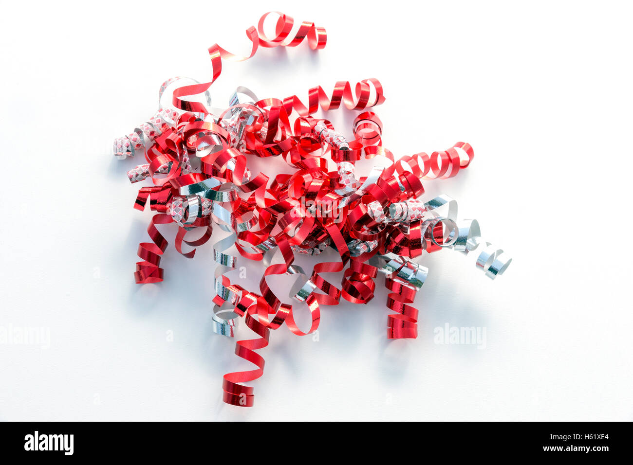 Curly gift ribbons in red, silver, white and patterned diamonds Stock ...