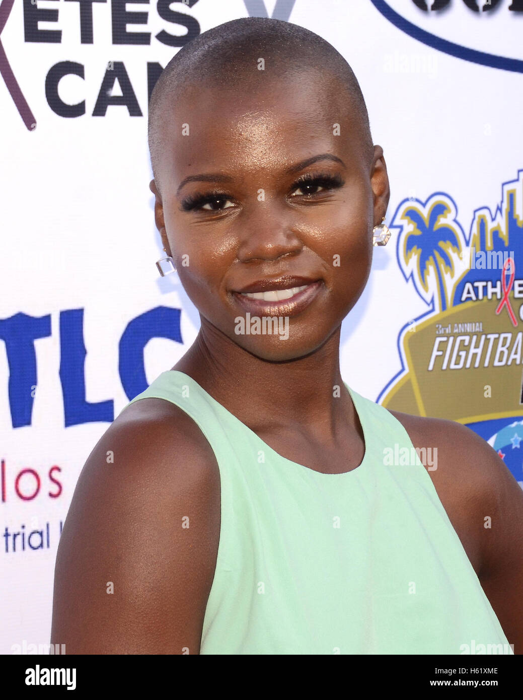 V. Bozeman arrived at the Athletes Vs. Cancer Celebrity Flag Football ...