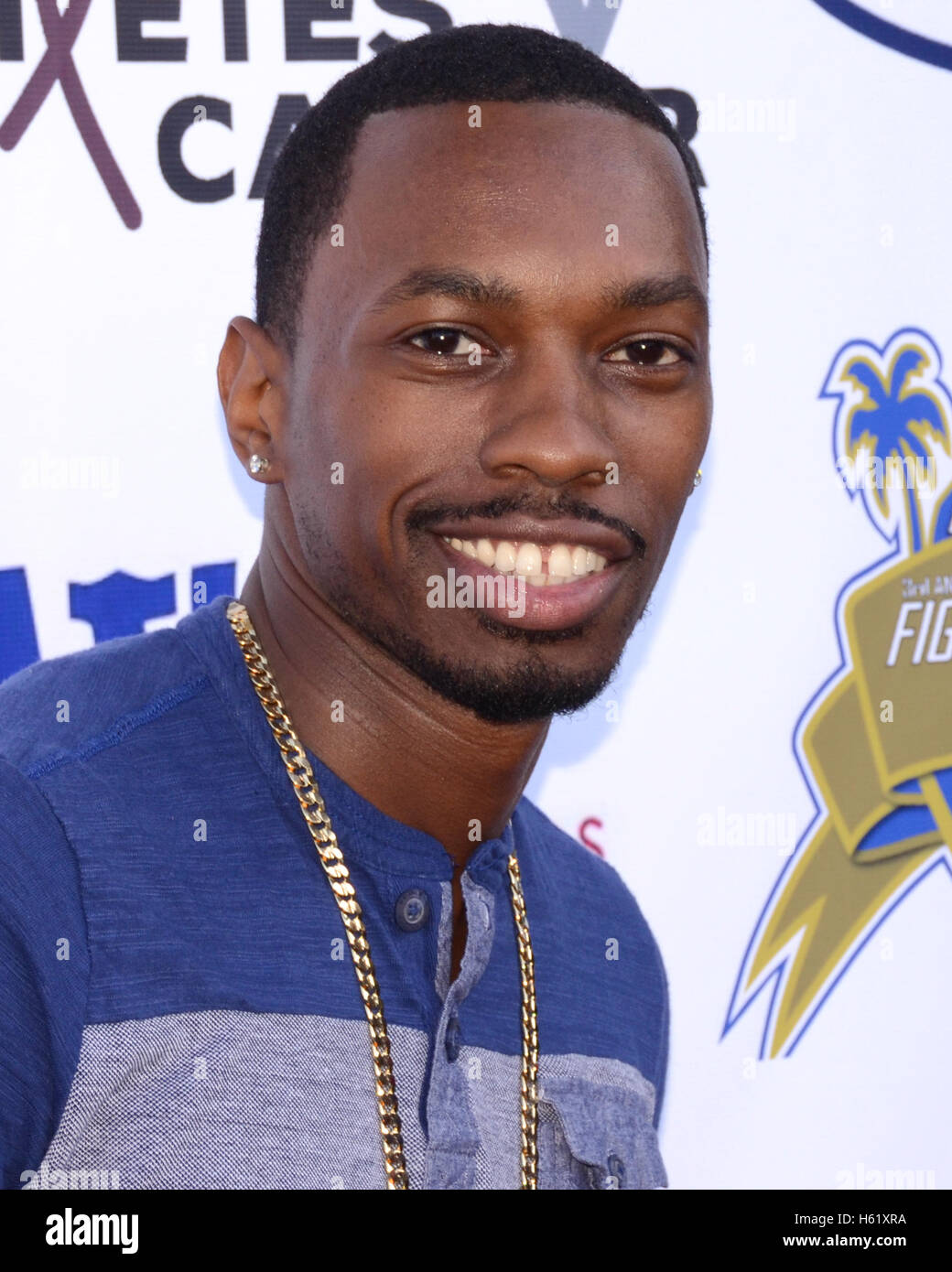 Melvin Jackson Jr, arrived at the Athletes Vs. Cancer Celebrity Flag ...