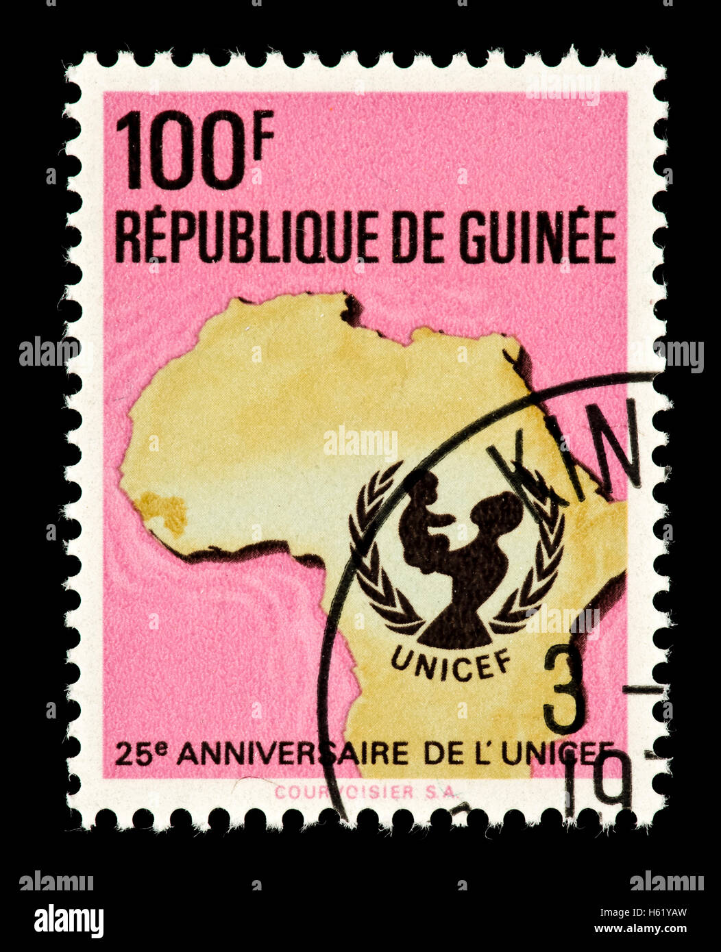 Postage stamp from Guinea depicting a map of Africa and the UNICEF ...