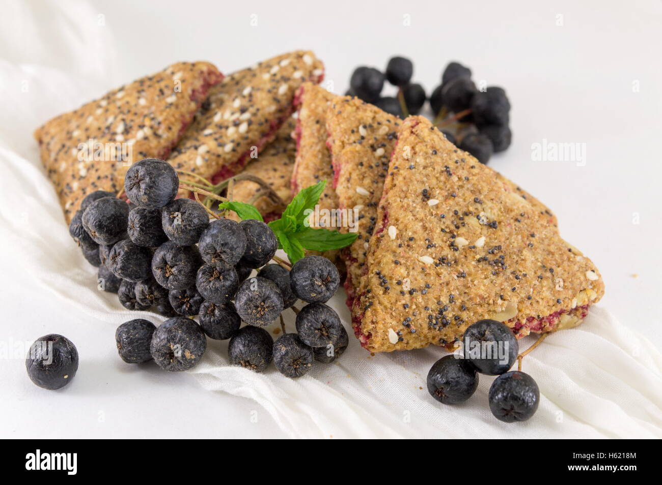 Sweet integral cookies with aronia fruit on a table Stock Photo - Alamy