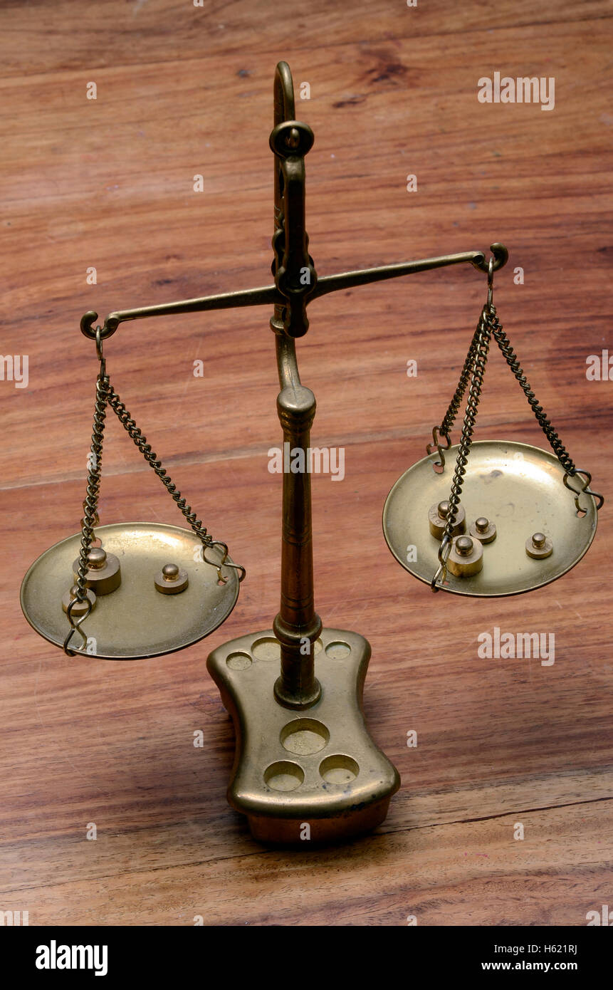 Old Golden weighing scale balance Stock Photo - Alamy