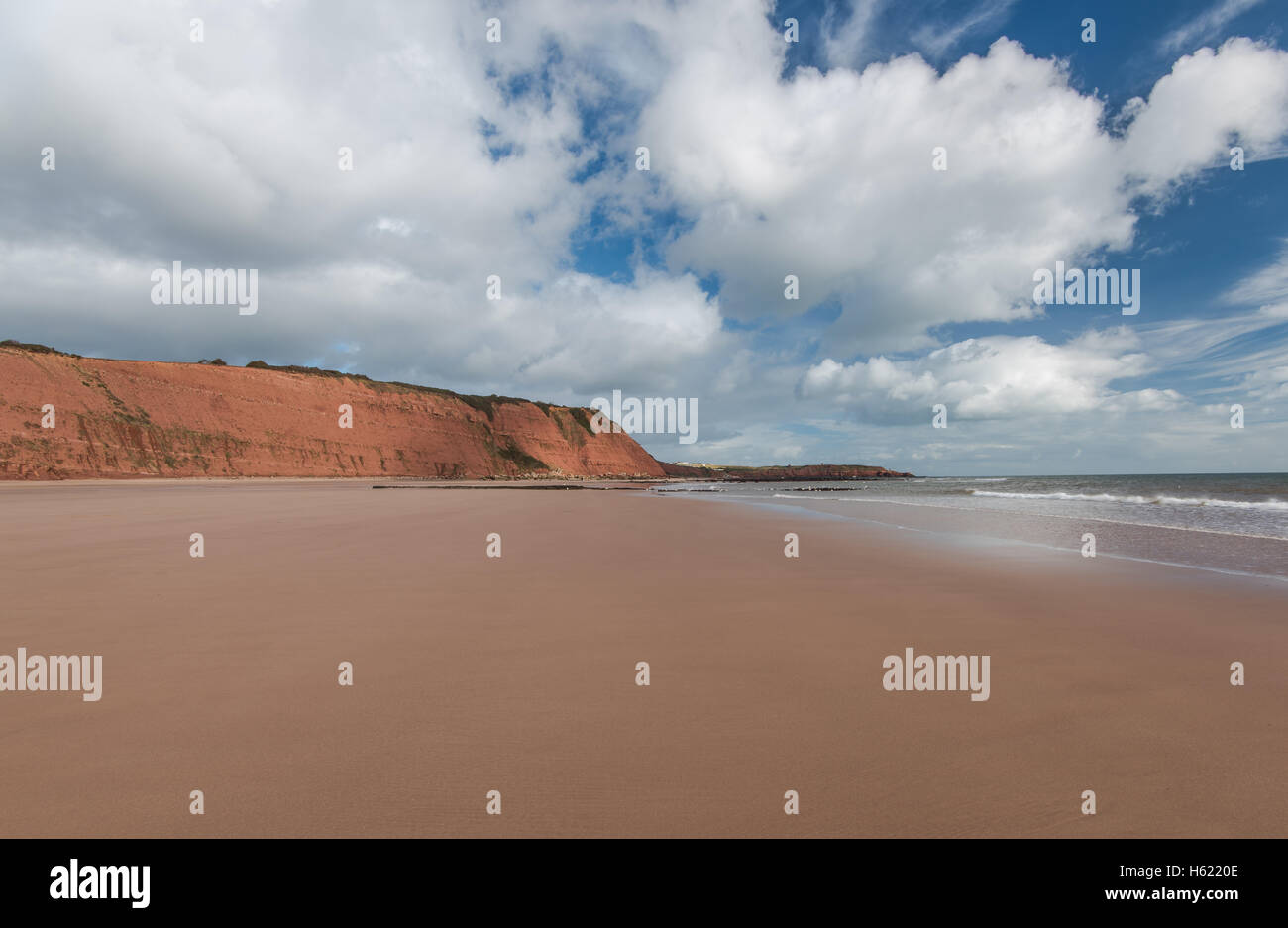 sandy beach with red sand in Exmouth ,Devon, UK. Jurassic coast ...