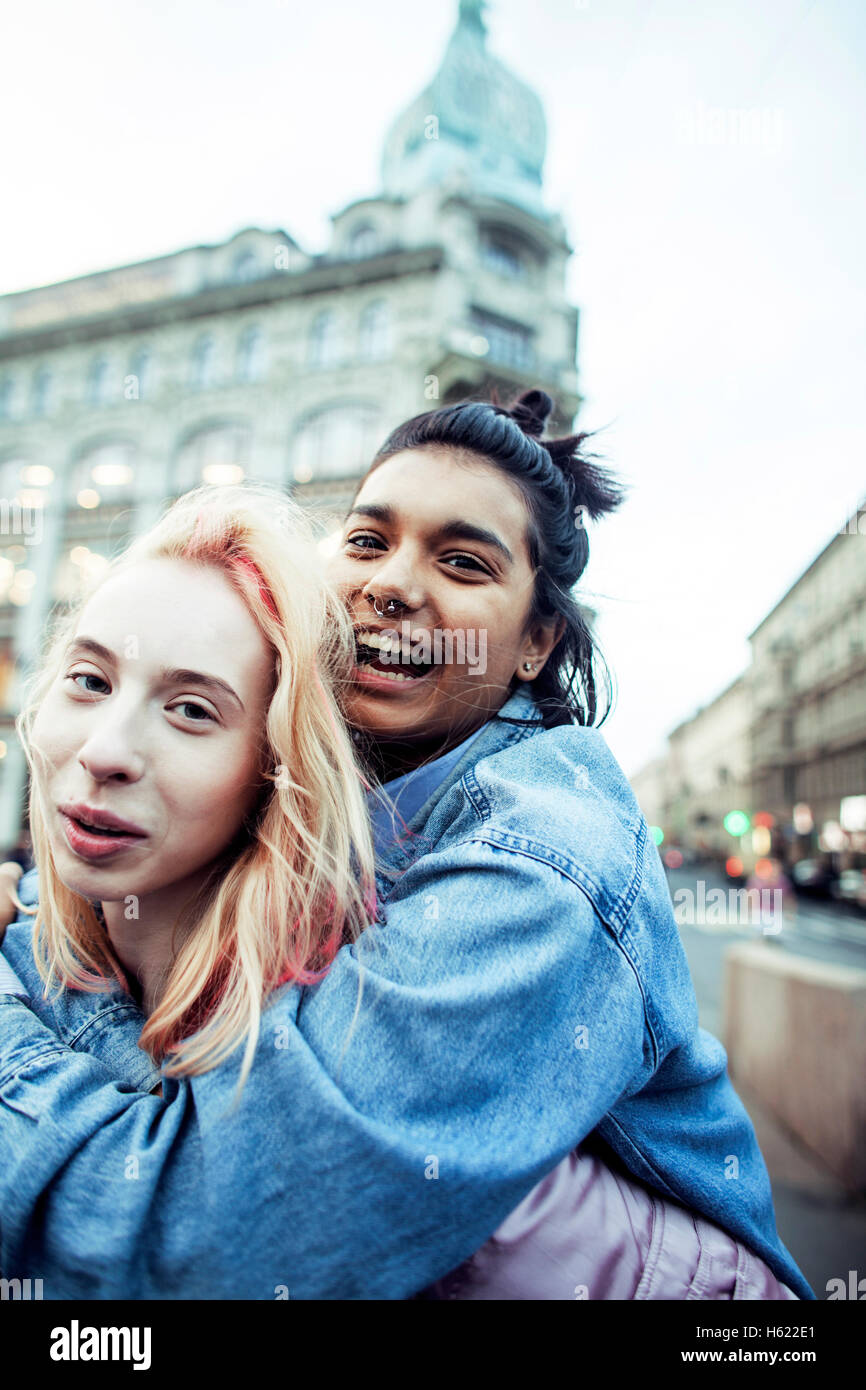 cute young couple of teenagers girlfriends having fun, traveling Stock ...