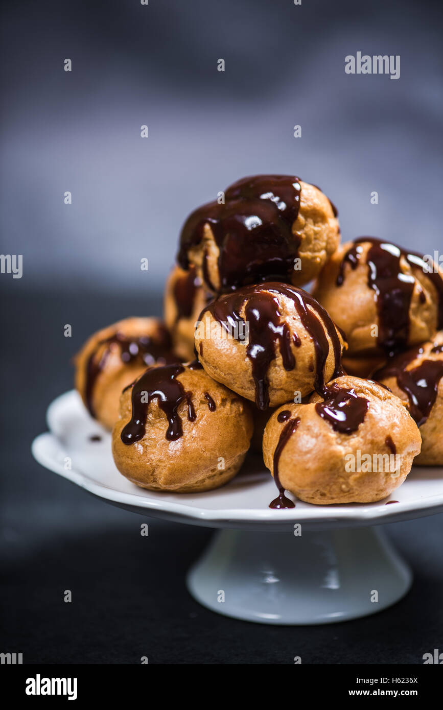 Stack of chocolate eclairs hi-res stock photography and images - Alamy