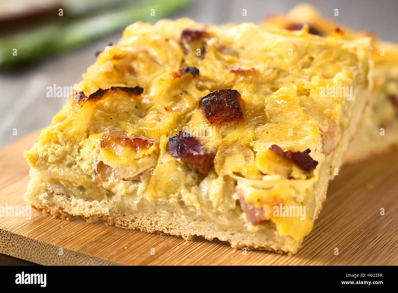 Traditional German Zwiebelkuchen savory onion cake pieces made of onion ...