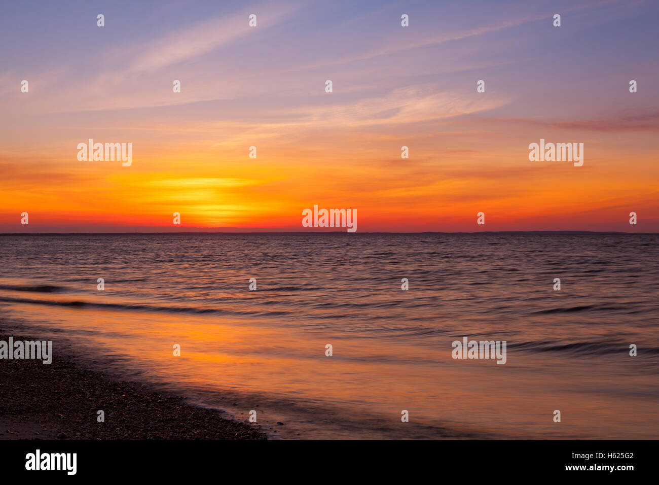 Beautiful sunset on remote beach hi-res stock photography and images ...