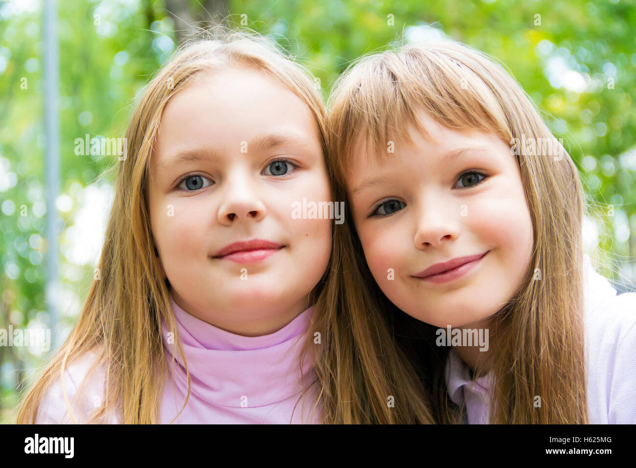 Cute two girls Stock Photo - Alamy