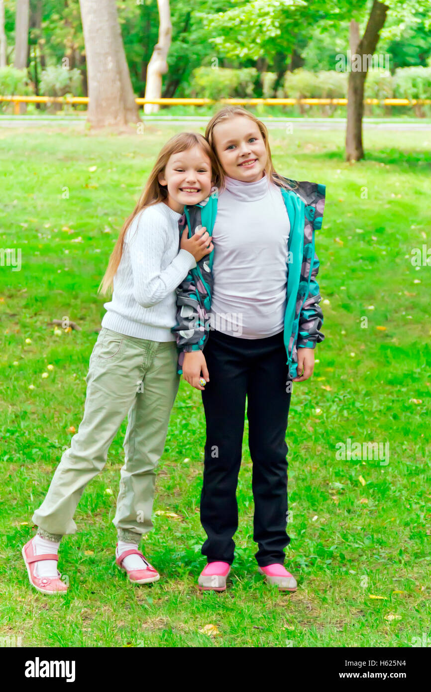 Cute two playing girls Stock Photo - Alamy