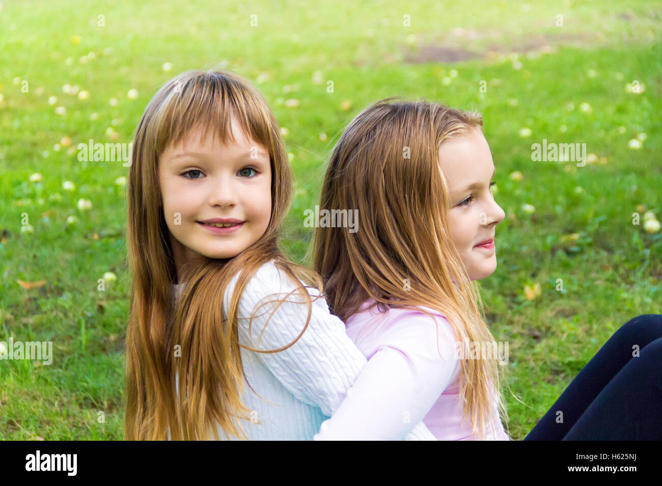 Cute two playing girls Stock Photo - Alamy