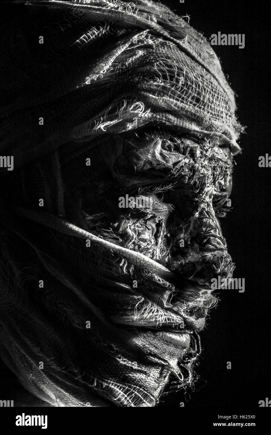 Male model in mummy zombie costume with papier mache, bandages ...