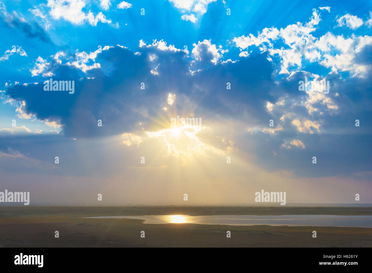 The rays of the sun at sunset, Sakhalin Island, Russia Stock Photo - Alamy
