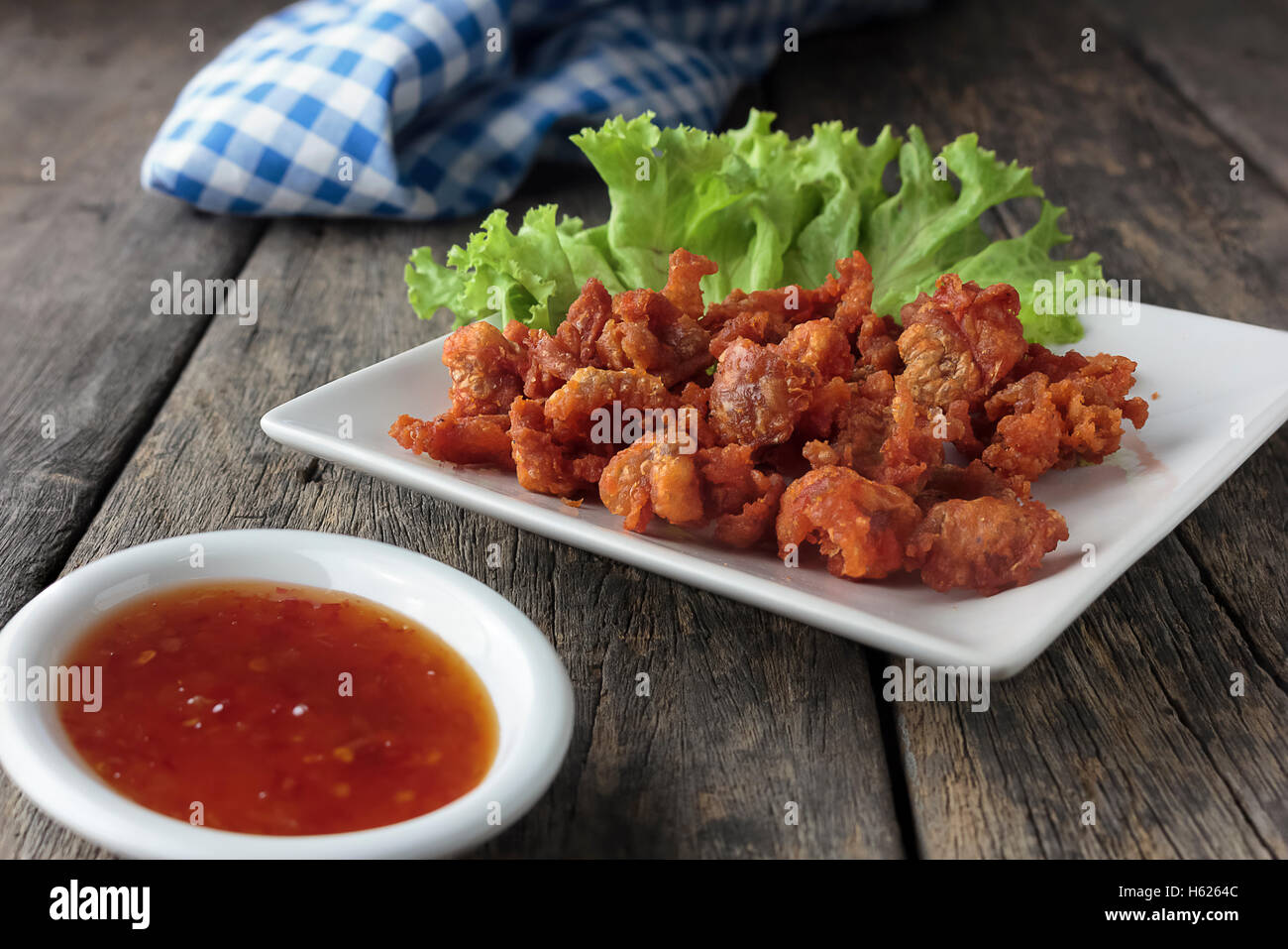 Fried chicken skin snacks thailand Stock Photo - Alamy