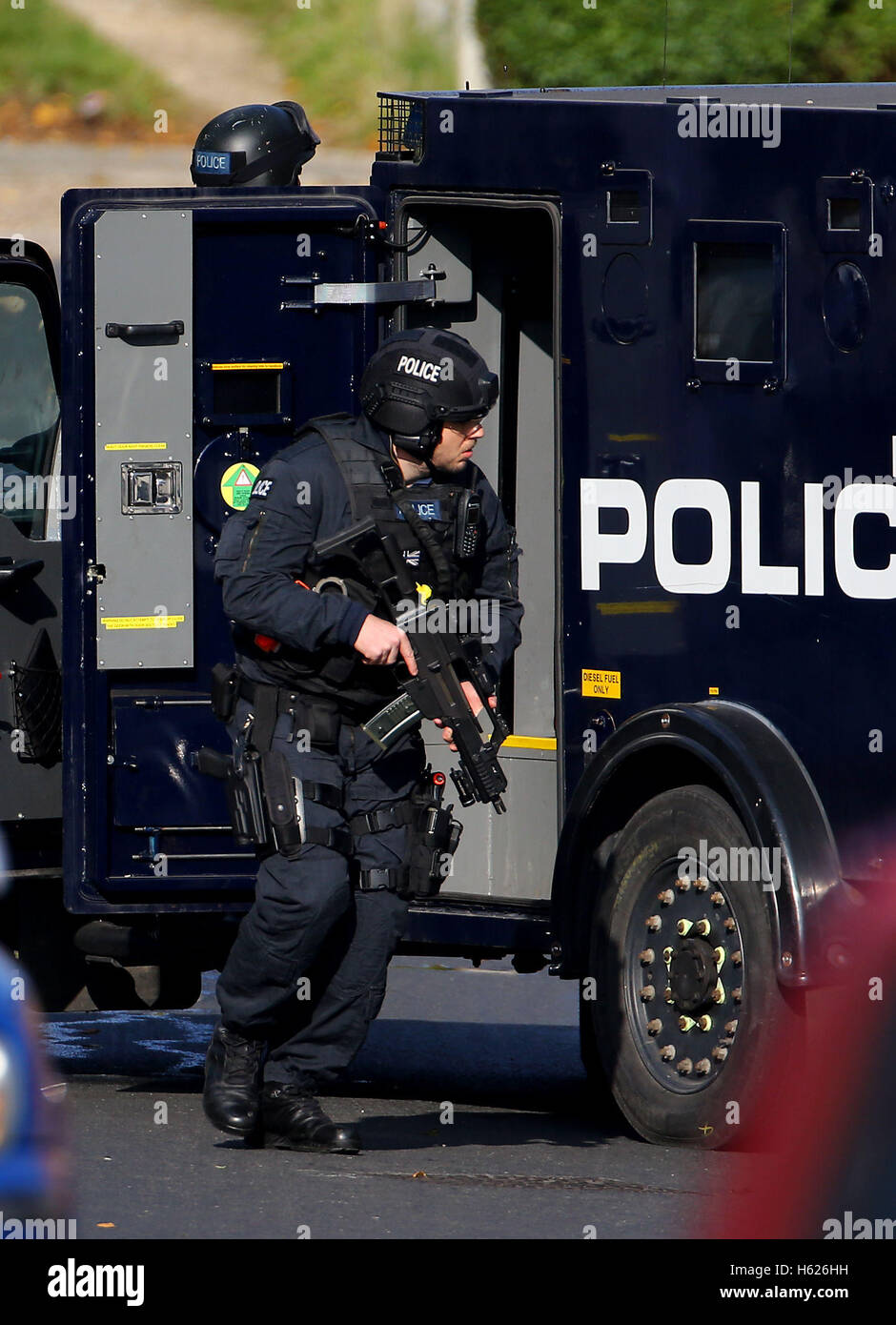 Armed police officers at the scene in Northolt, London, where they ...