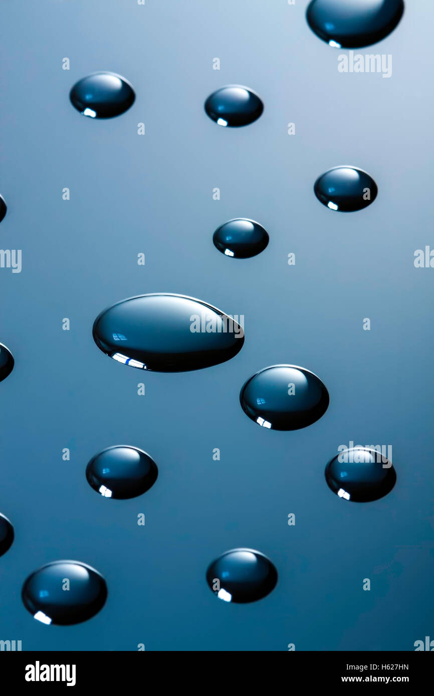 Water drops on gradient background studio shot Stock Photo - Alamy