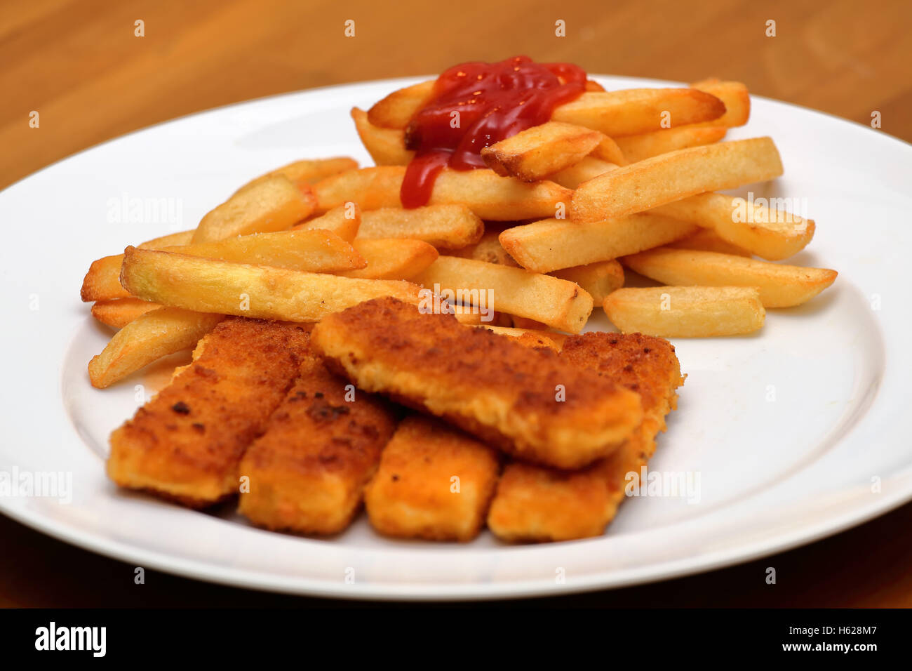 fish sticks with french fries Stock Photo - Alamy