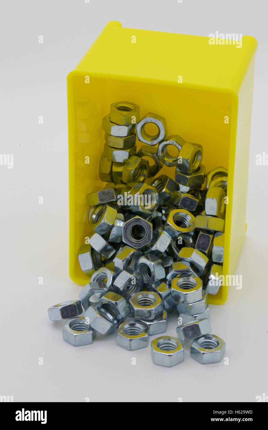 nuts in a yellow container Stock Photo - Alamy